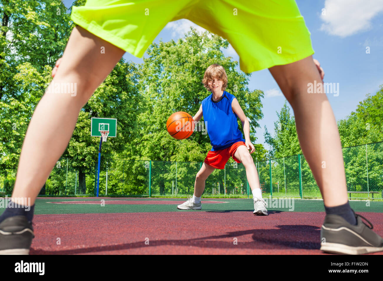 Hands between legs hi-res stock photography and images - Alamy