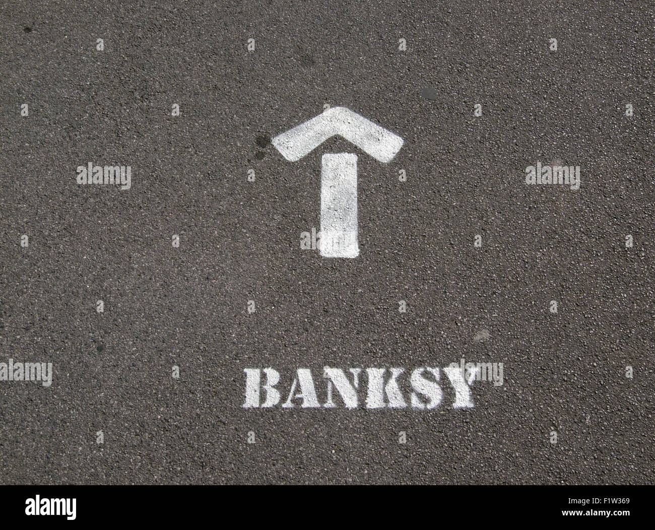 A sign spray-painted on a pavement in Weston-super-Mare, England ...