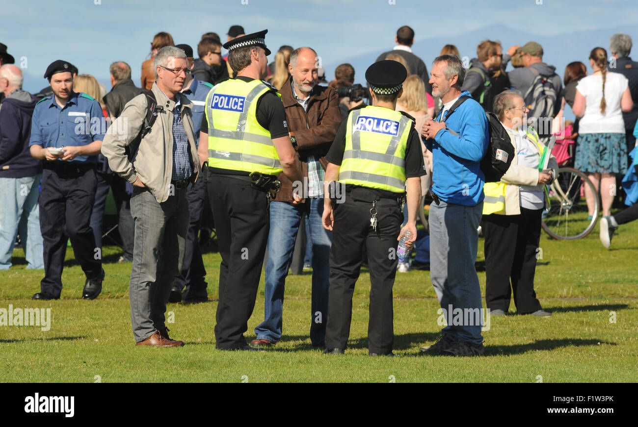 Police Officers Helping The Community