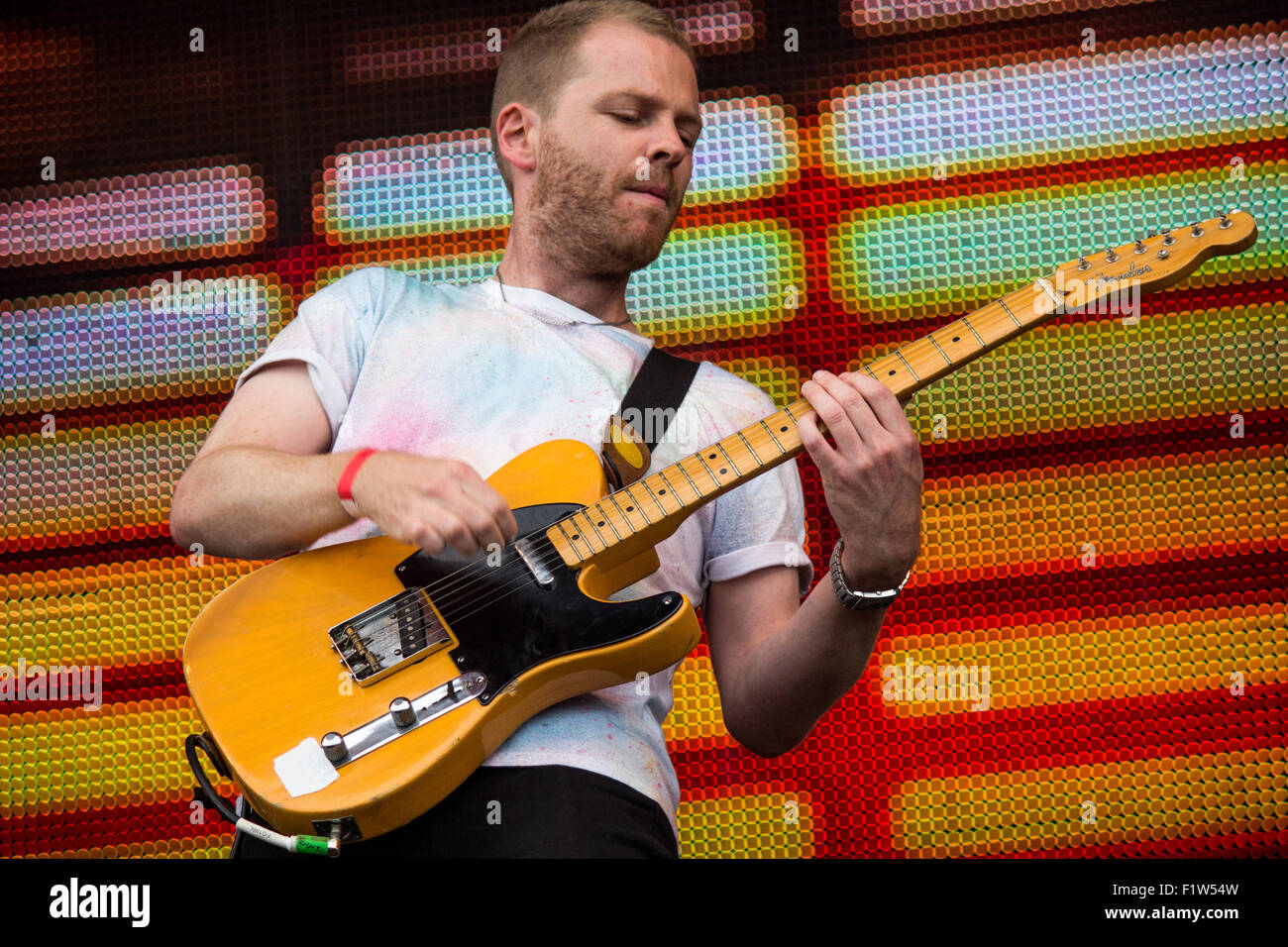 Craig Wellington of The Sunshine Underground playing guitar at ...