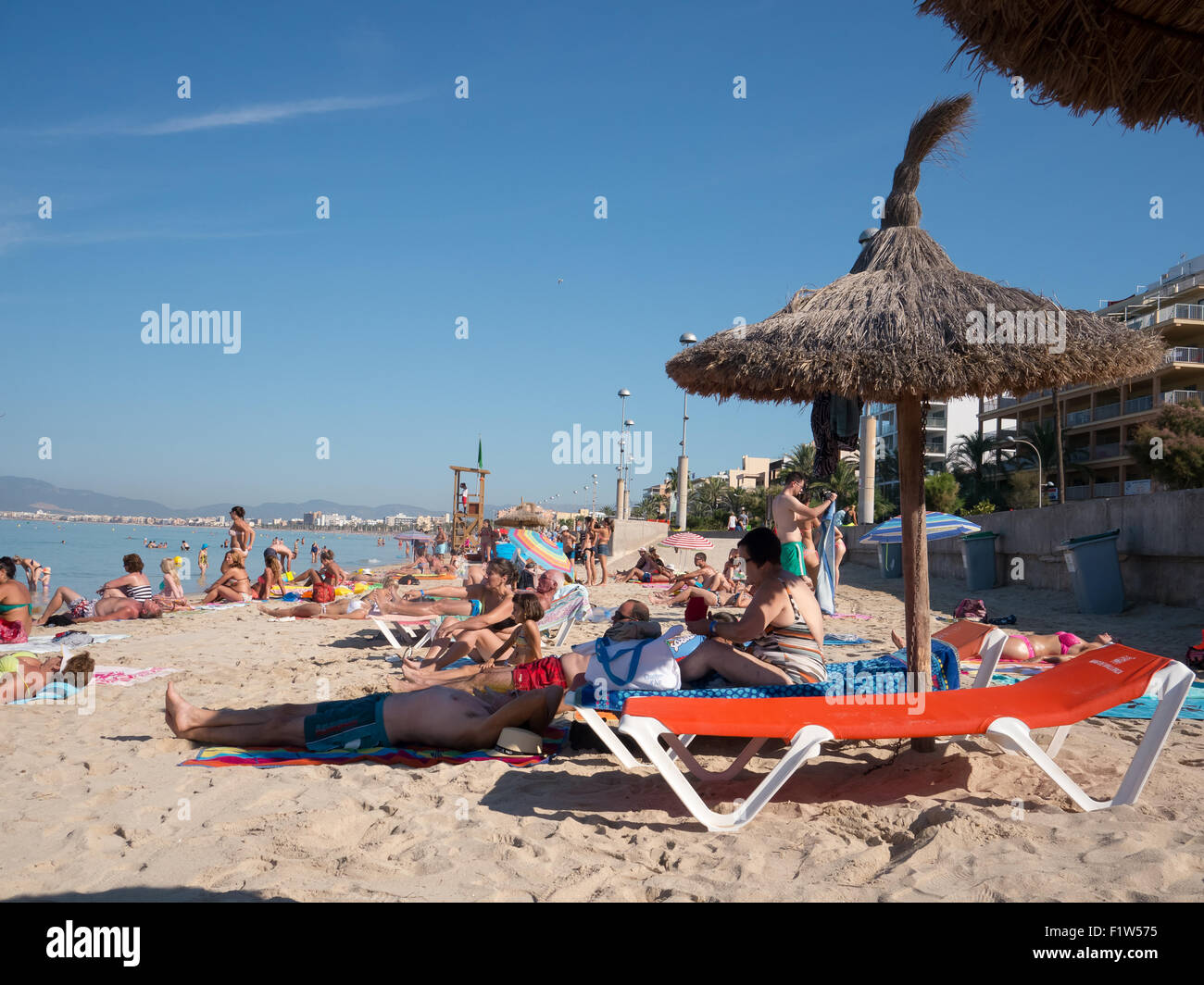 Tourists sunbathing on El Arenal Beach, Mallorca, Balearic Islands ...