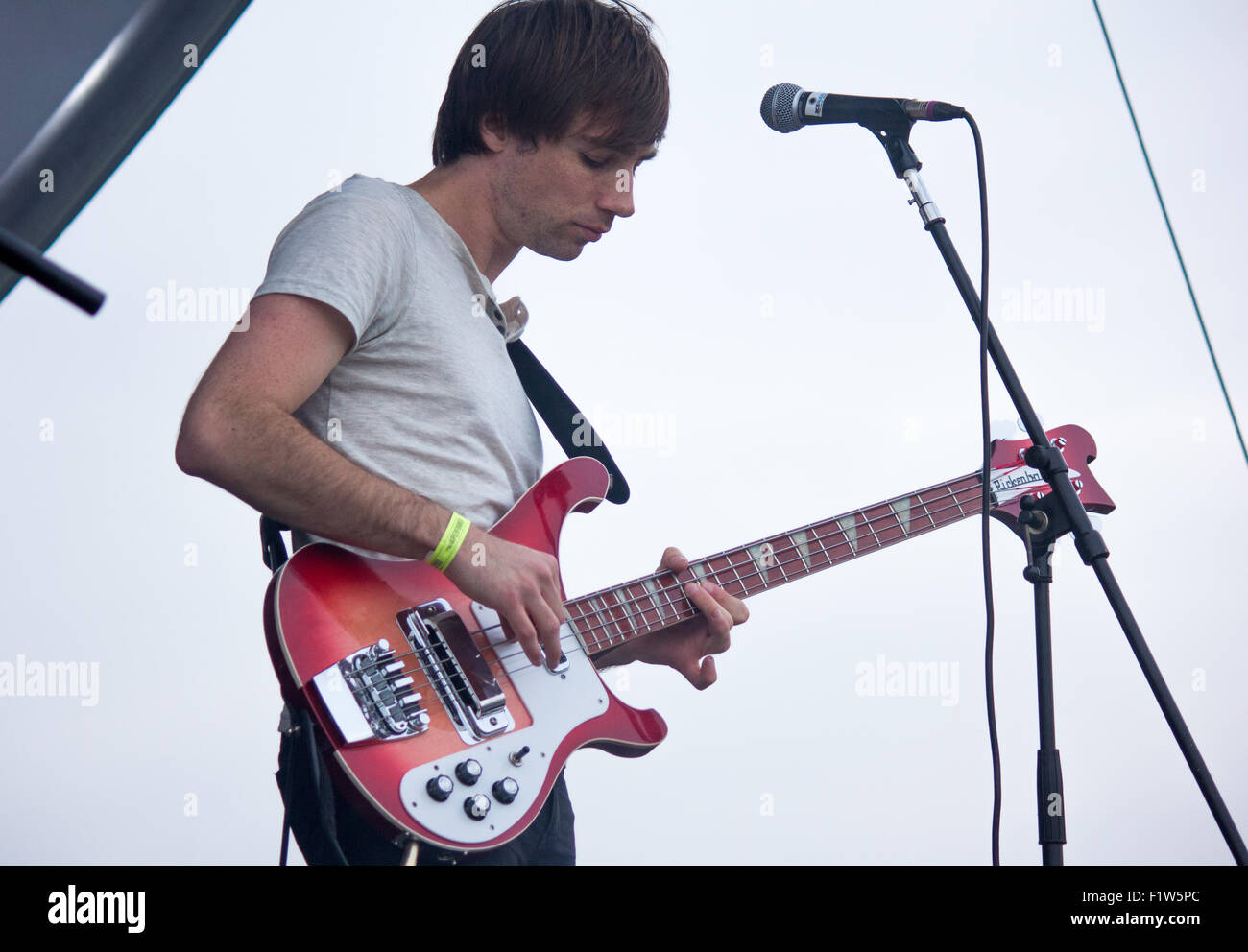 Tom Wells of Kassassin Street playing bass guitar at Victorious ...