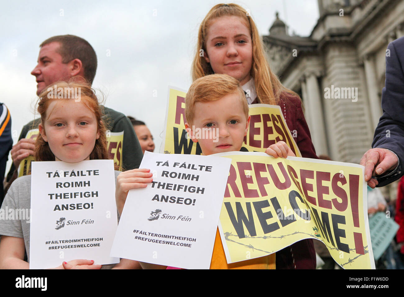 Belfast, Northern Ireland, UK. 30th Aug, 2015. UK.Children holding ...