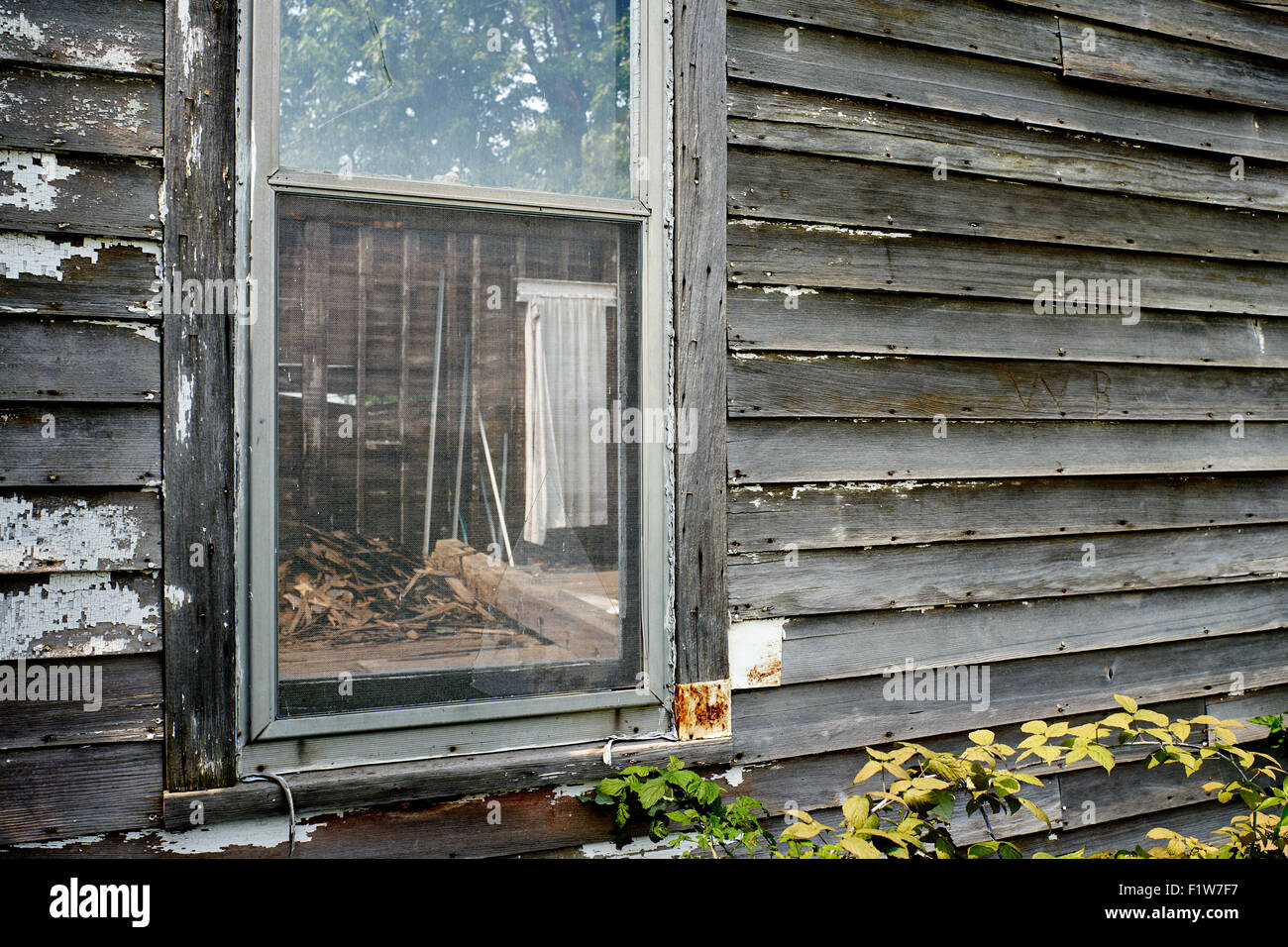 Looking through the window of an abandoned house Stock Photo - Alamy