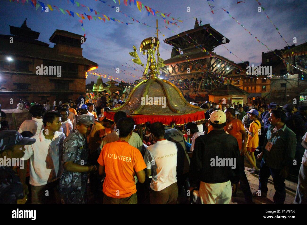 Lalitpur, Nepal. 7th Sep, 2015. Devotees offer prayers to Lord Bhimsen ...