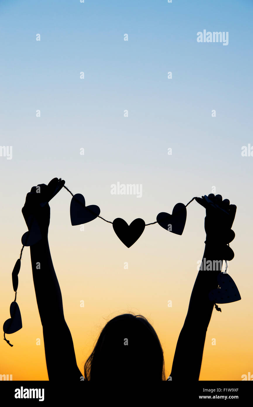 Hold in your arms hi-res stock photography and images - Alamy