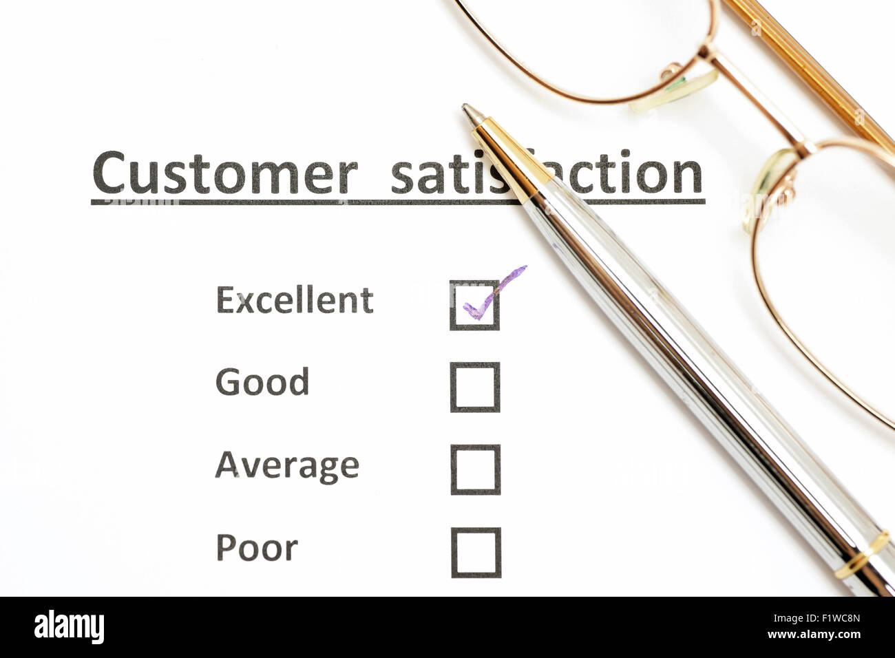 customer satisfaction survey form with the pen and eye glasses Stock ...