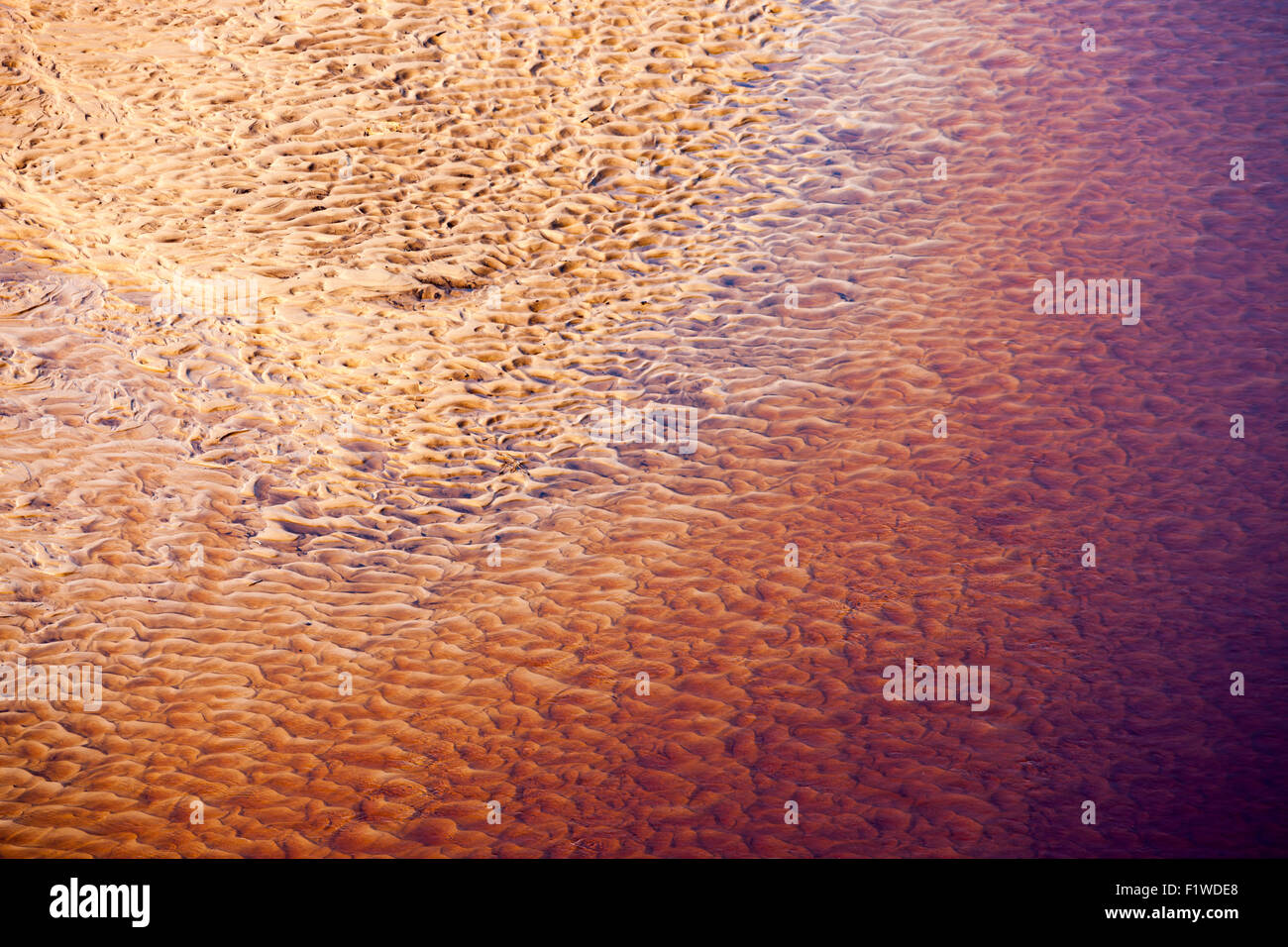 Wavy sand texture patterns on the bottom of the river in red Stock ...
