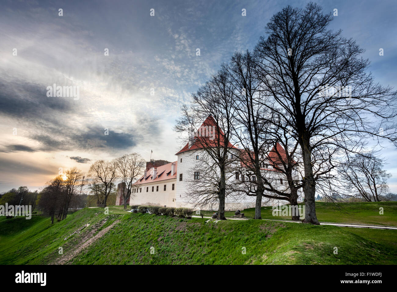 Bauska castle restored part during sunset time. HDR image Stock Photo ...