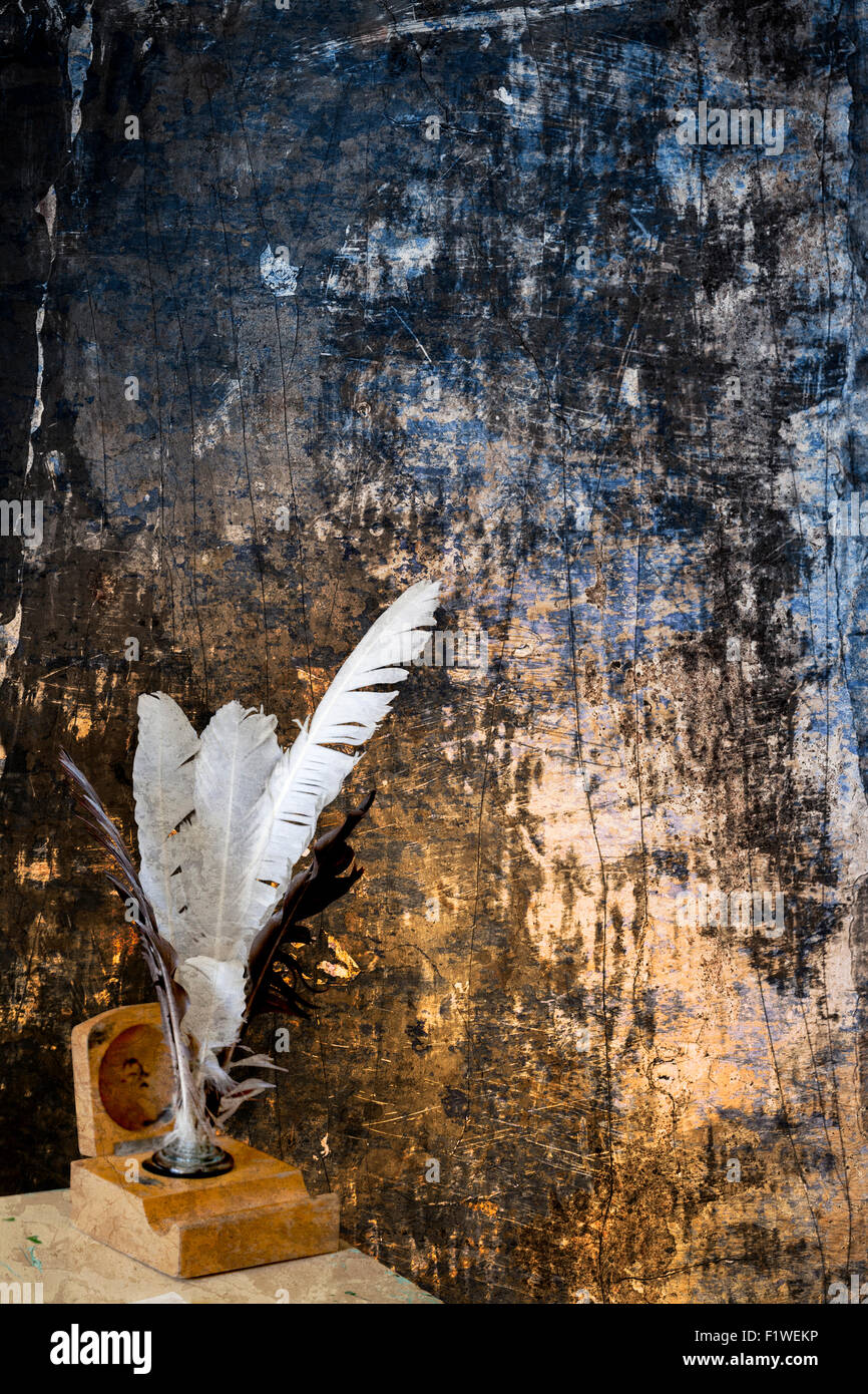 Quill and Inkwell over grunge background with place for your copy text ...