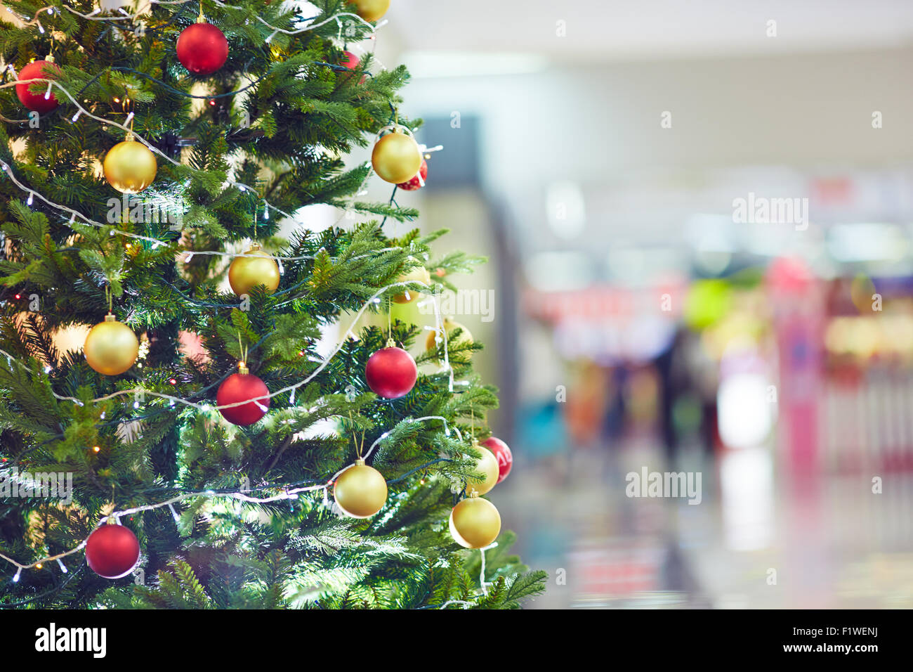 Christmas firtree with decorative toy balls in trade center Stock Photo ...