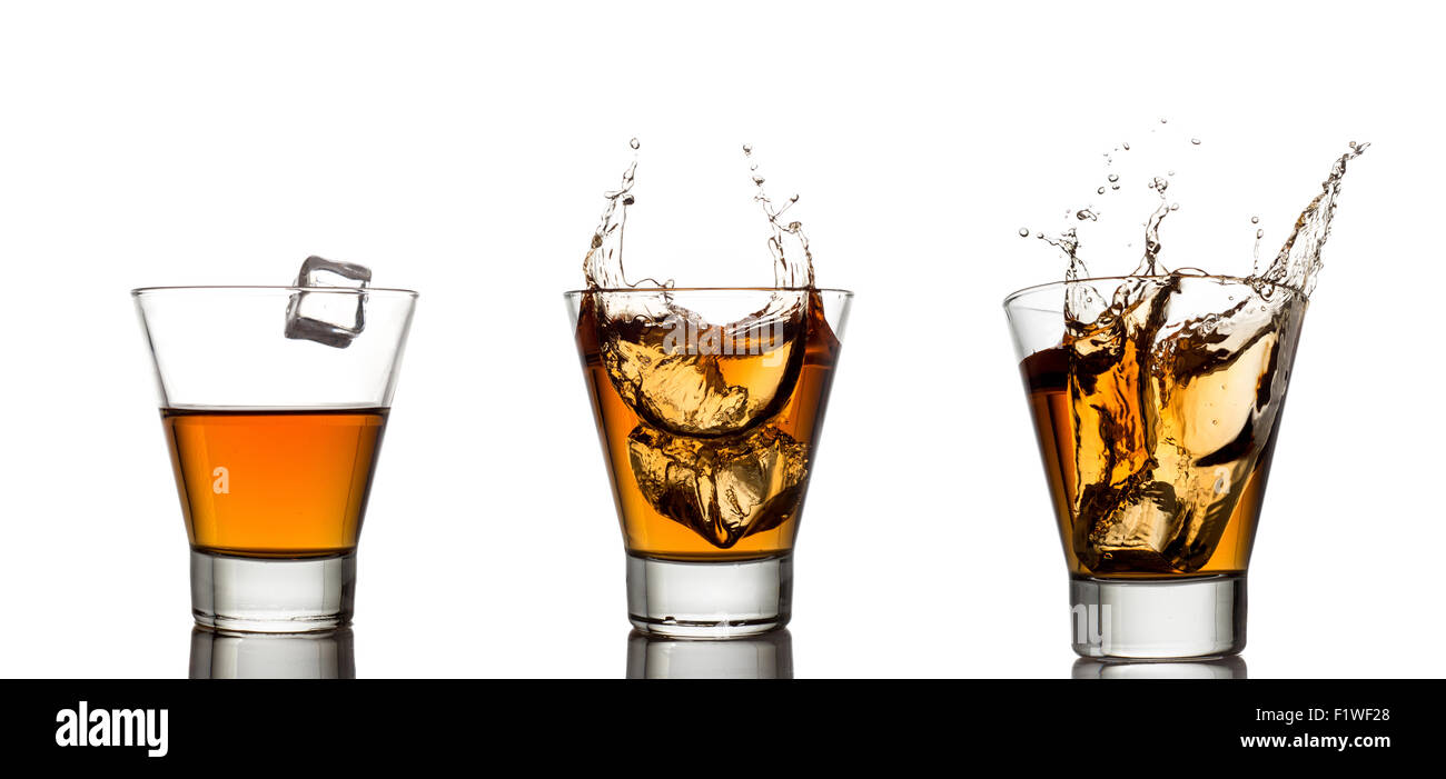 whisky splash in glass isolated on a white Stock Photo - Alamy