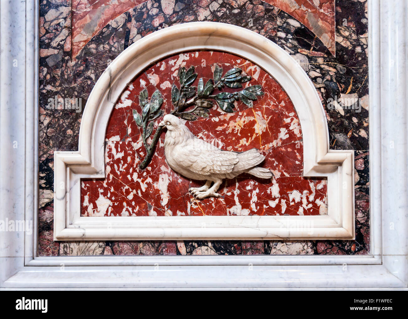 Detail shot of a dove with a branch in its mouth in marble, Saint Peter ...