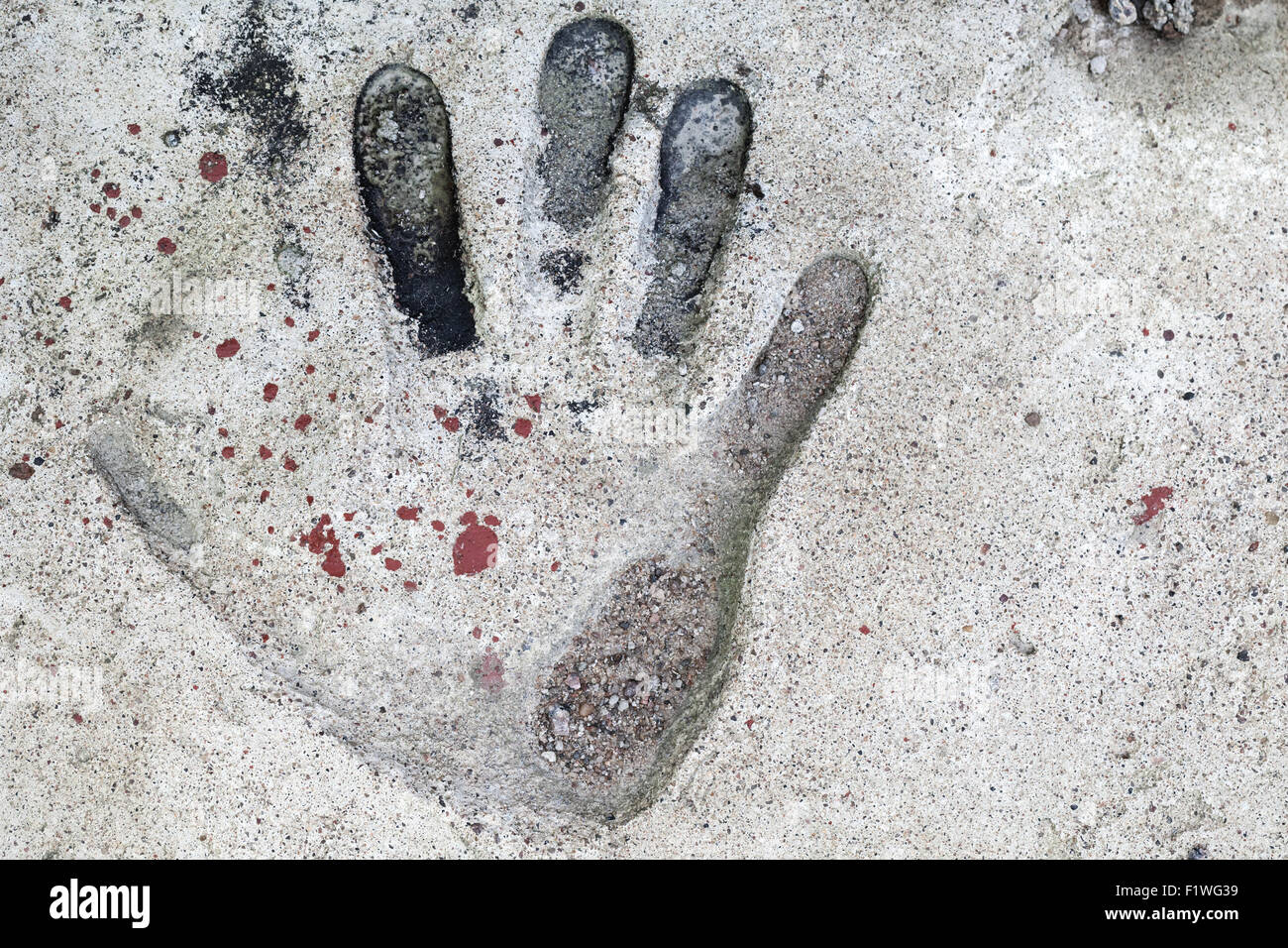 Hand print in concrete hi-res stock photography and images - Alamy