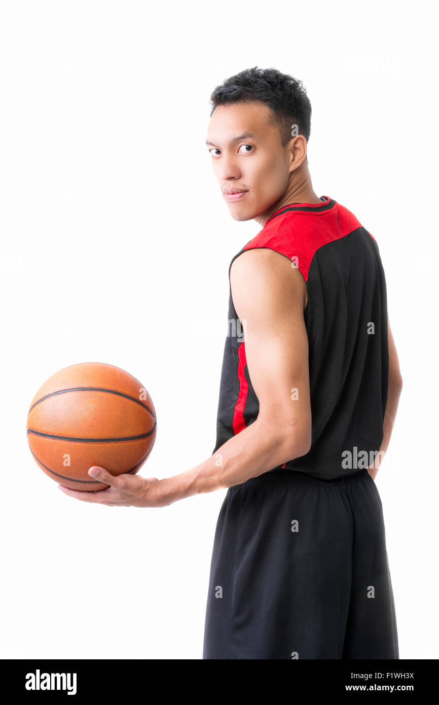 Asian young basketball player on white background Stock Photo - Alamy