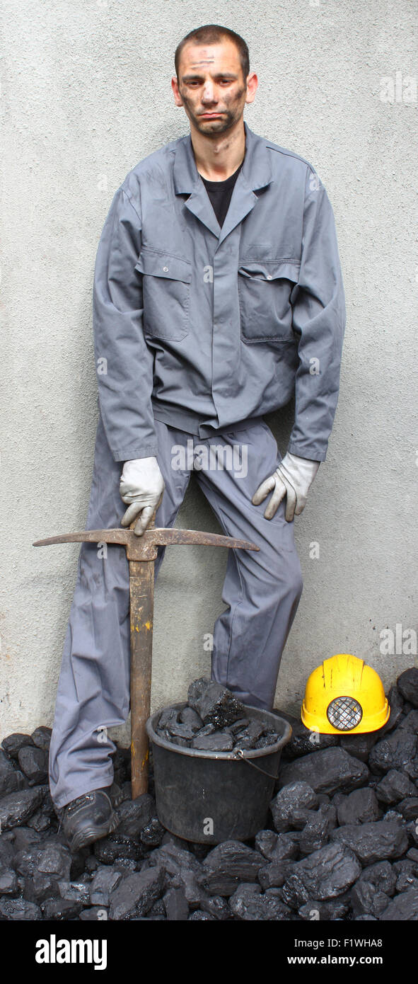 Portrait of a miner while working in a coal mine Stock Photo - Alamy