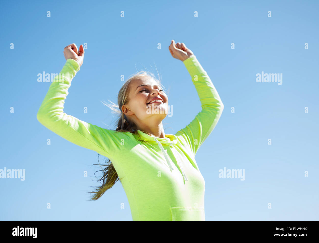 woman runner celebrating victory Stock Photo - Alamy