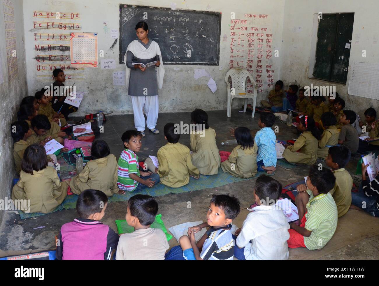Allahabad, India. 08th Sep, 2015. School children attend a class at a ...