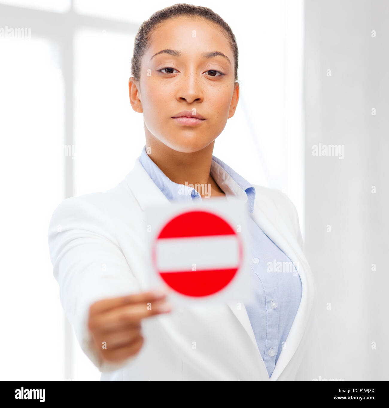 african woman showing stop sign Stock Photo - Alamy