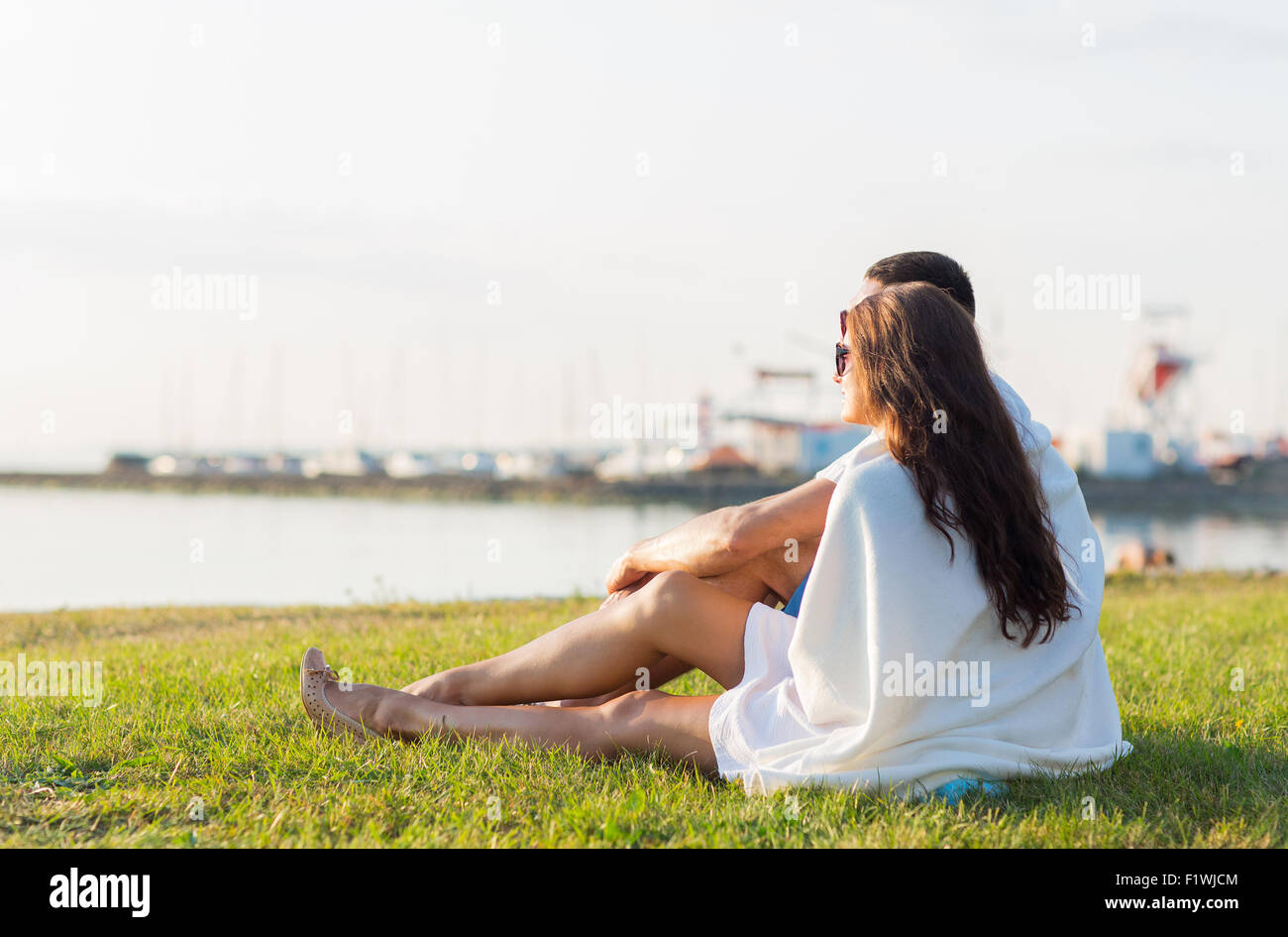 Family sitting on the waterfront hi-res stock photography and images ...