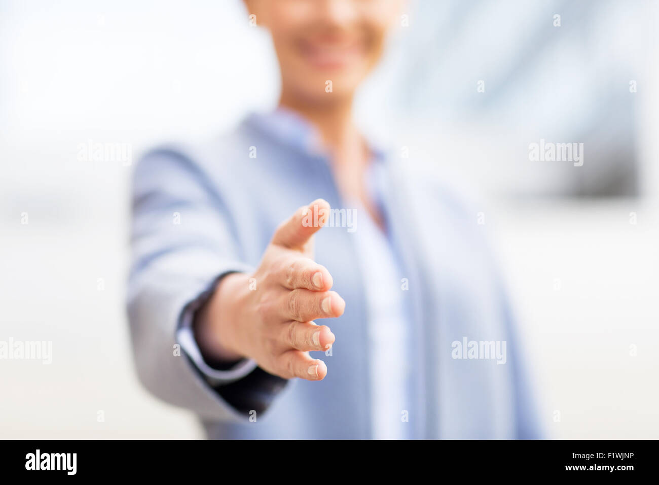 close up of woman giving hand for handshake Stock Photo - Alamy