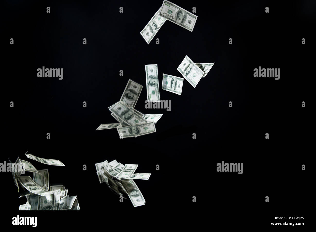 Money flying dollar hi-res stock photography and images - Alamy