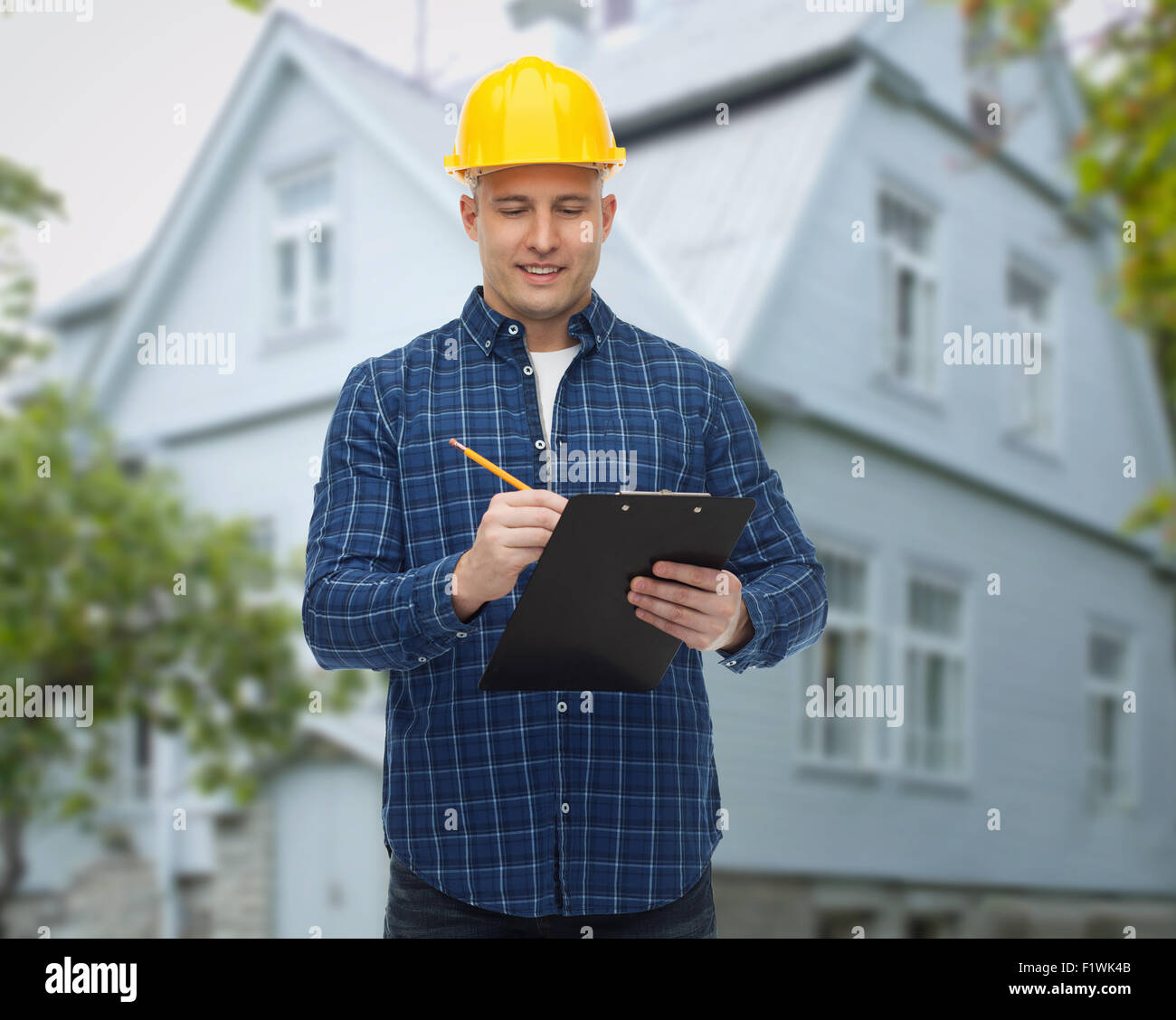 Professional foreman filling in documents hi-res stock photography and ...