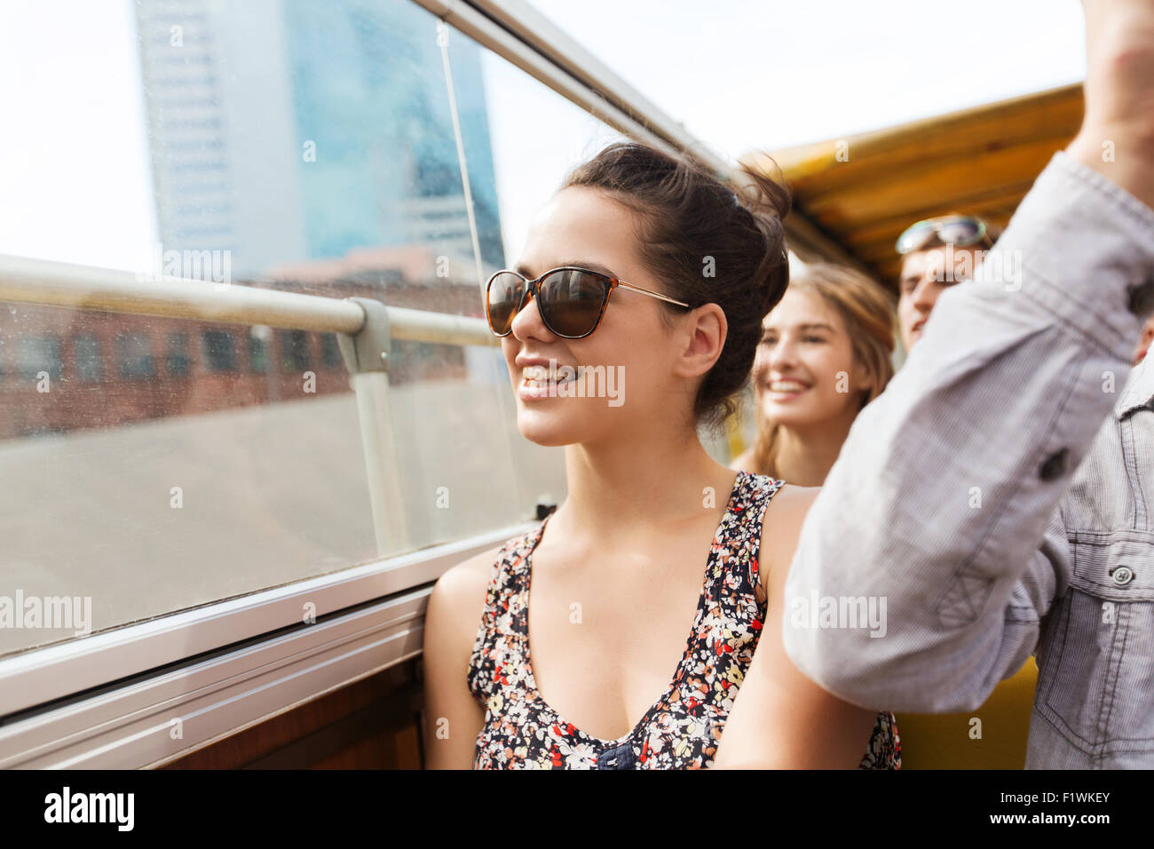 teenage girl with friends traveling by tour bus Stock Photo - Alamy