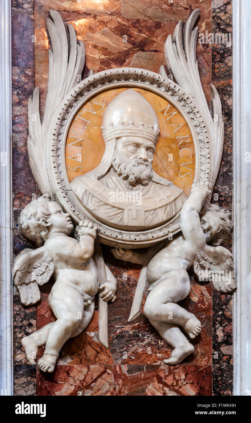 Detail shot of a marble plaque of Saint Mark inside Saint Peter's ...