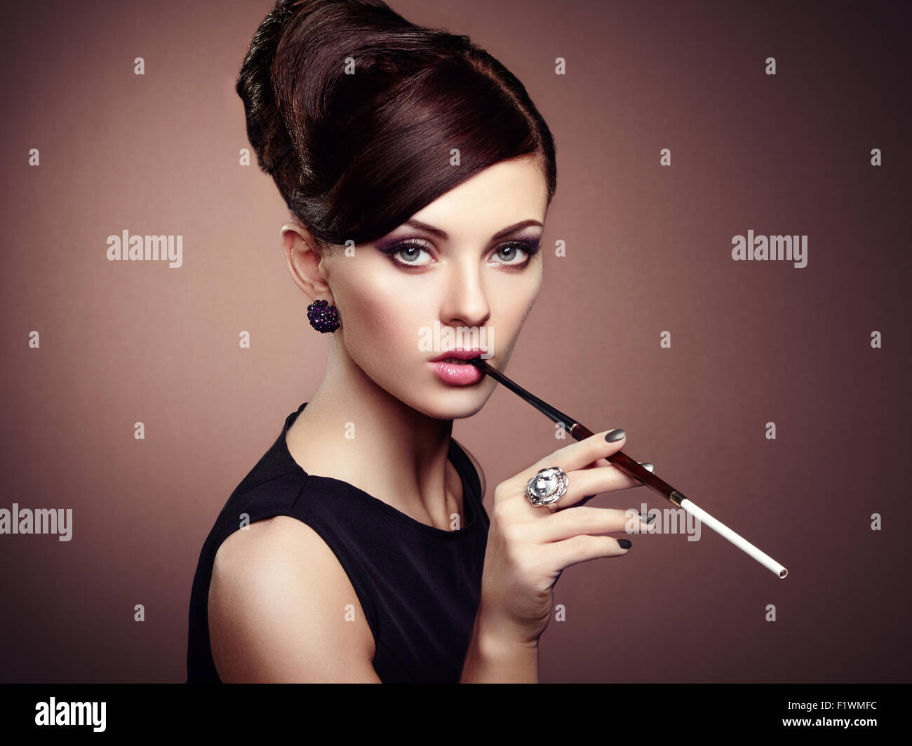 Portrait of beautiful sensual woman with elegant hairstyle. Woman with ...