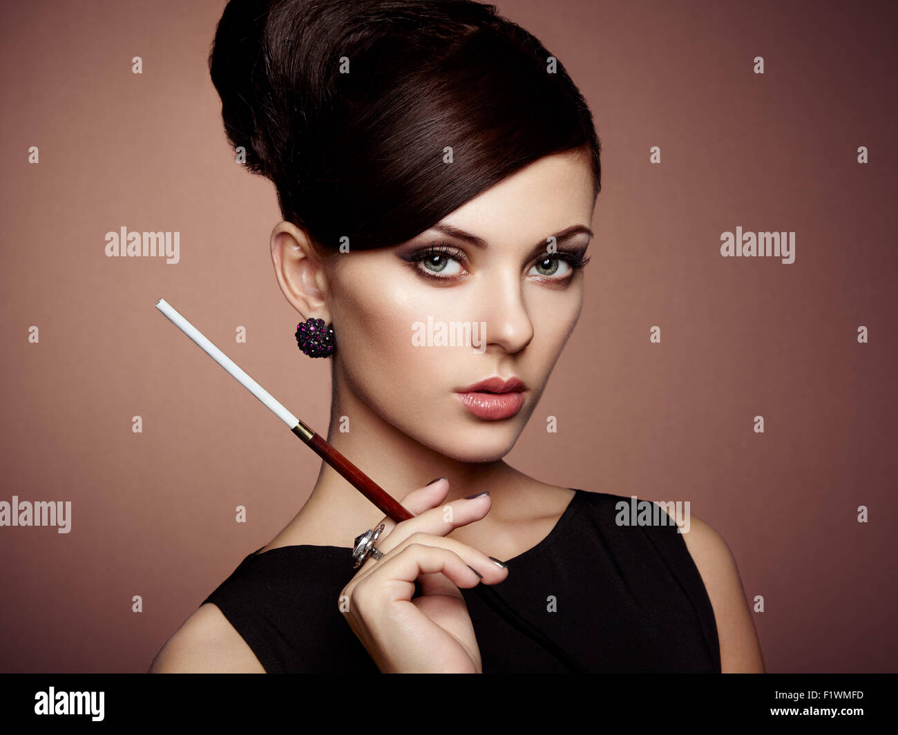 Portrait of beautiful sensual woman with elegant hairstyle. Woman with ...