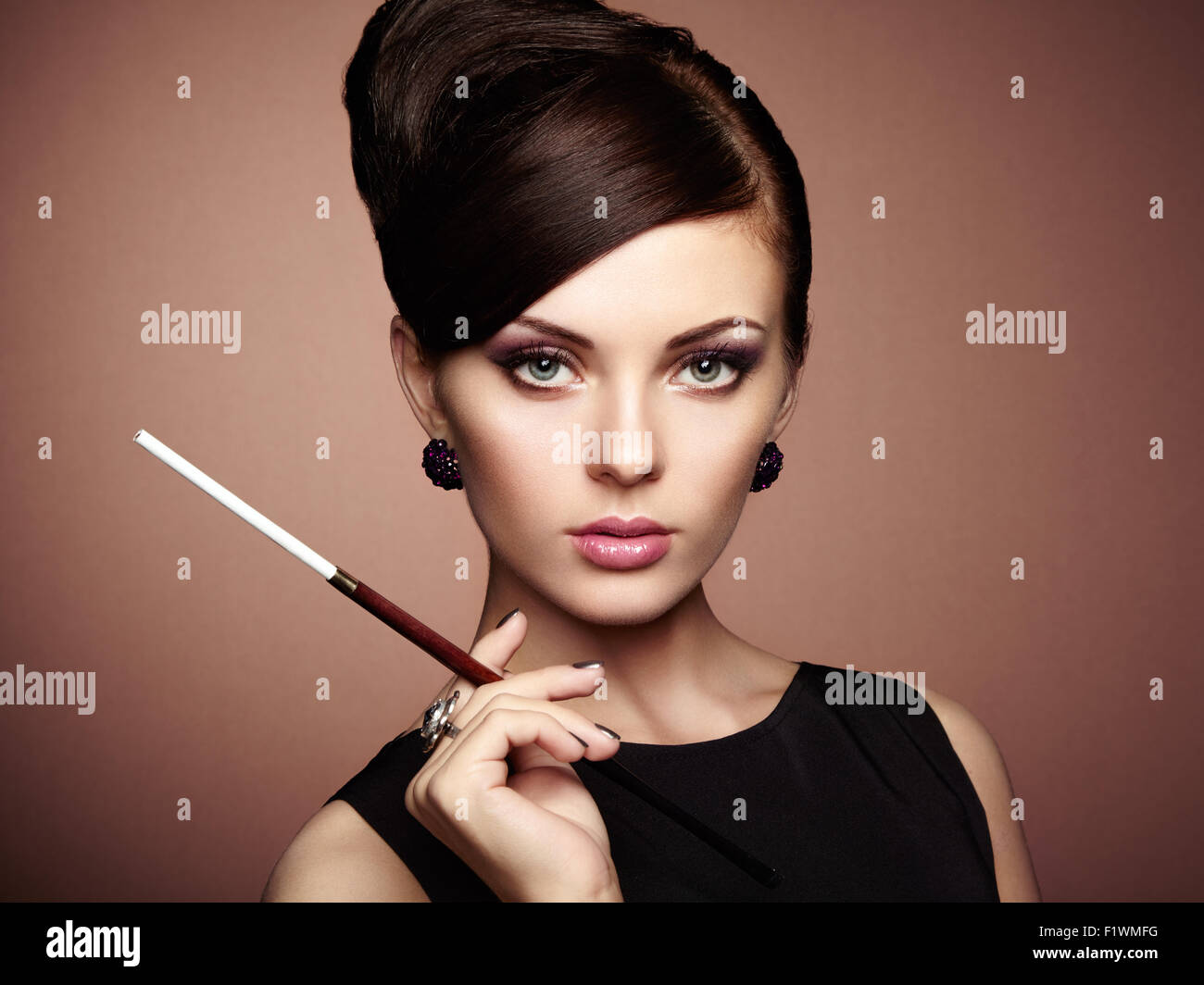 Portrait of beautiful sensual woman with elegant hairstyle. Woman with ...