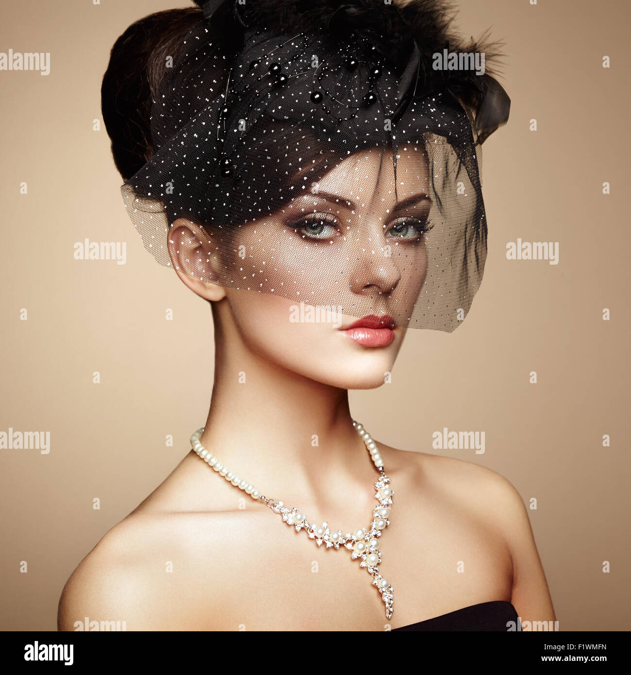 Retro portrait of a beautiful woman. Vintage style. Perfect make-up ...