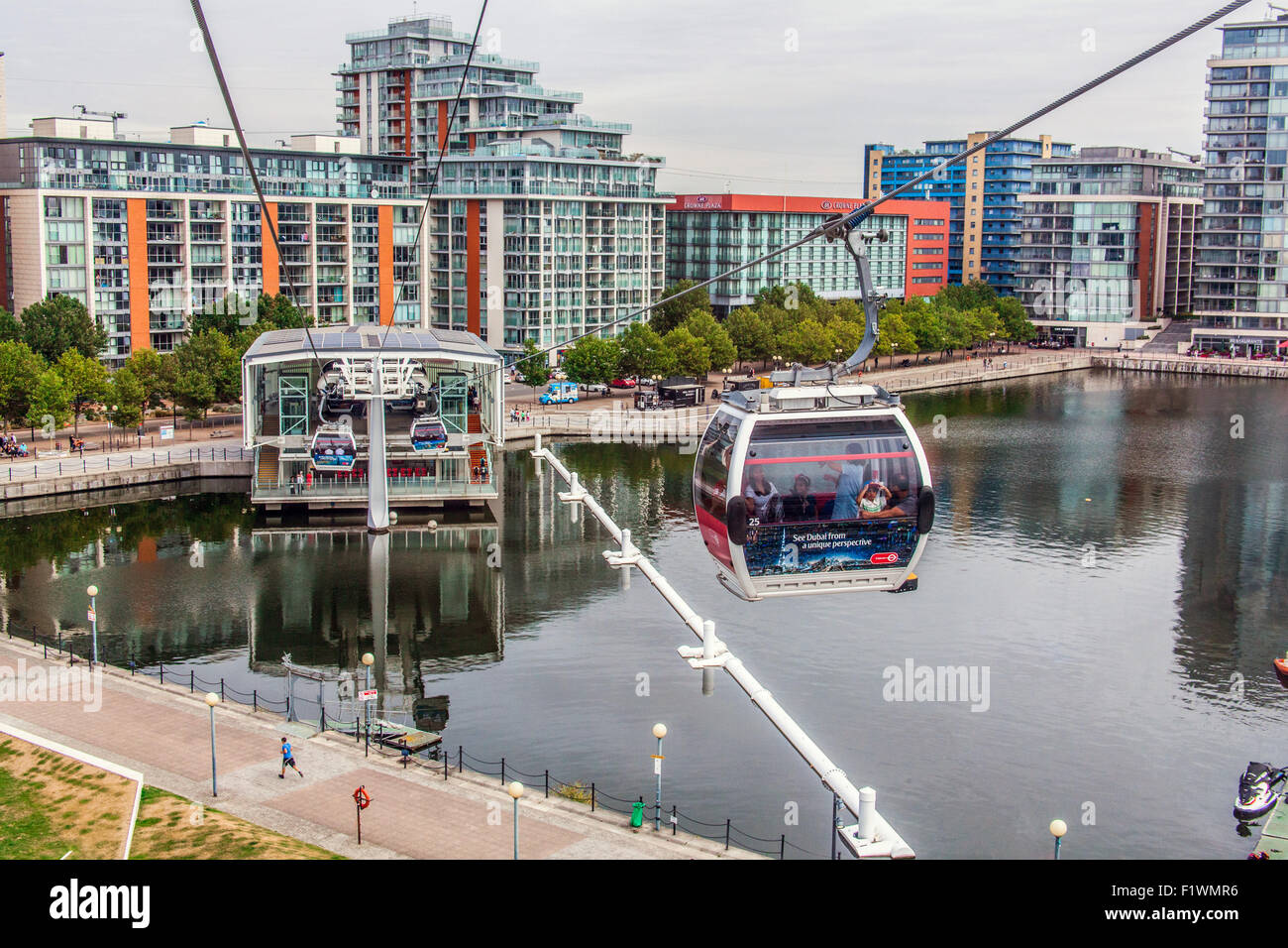 Emirates Air Line cable cars ride across the River Thames from North ...
