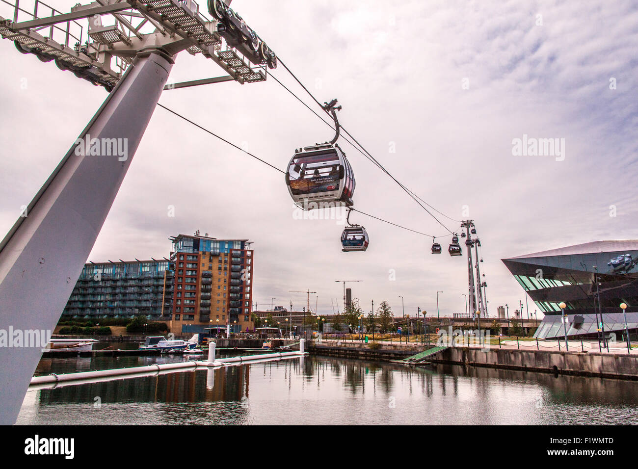 Emirates Air Line cable cars ride across the River Thames from North ...