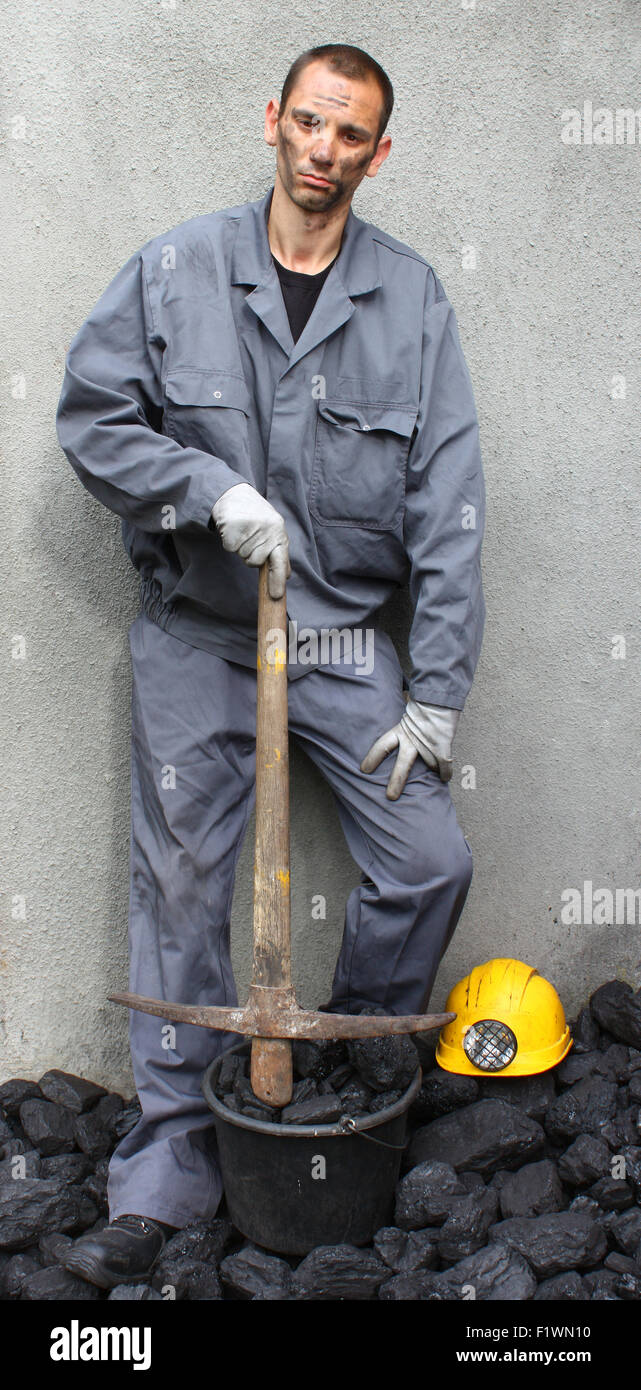Portrait of a miner while working in a coal mine Stock Photo - Alamy