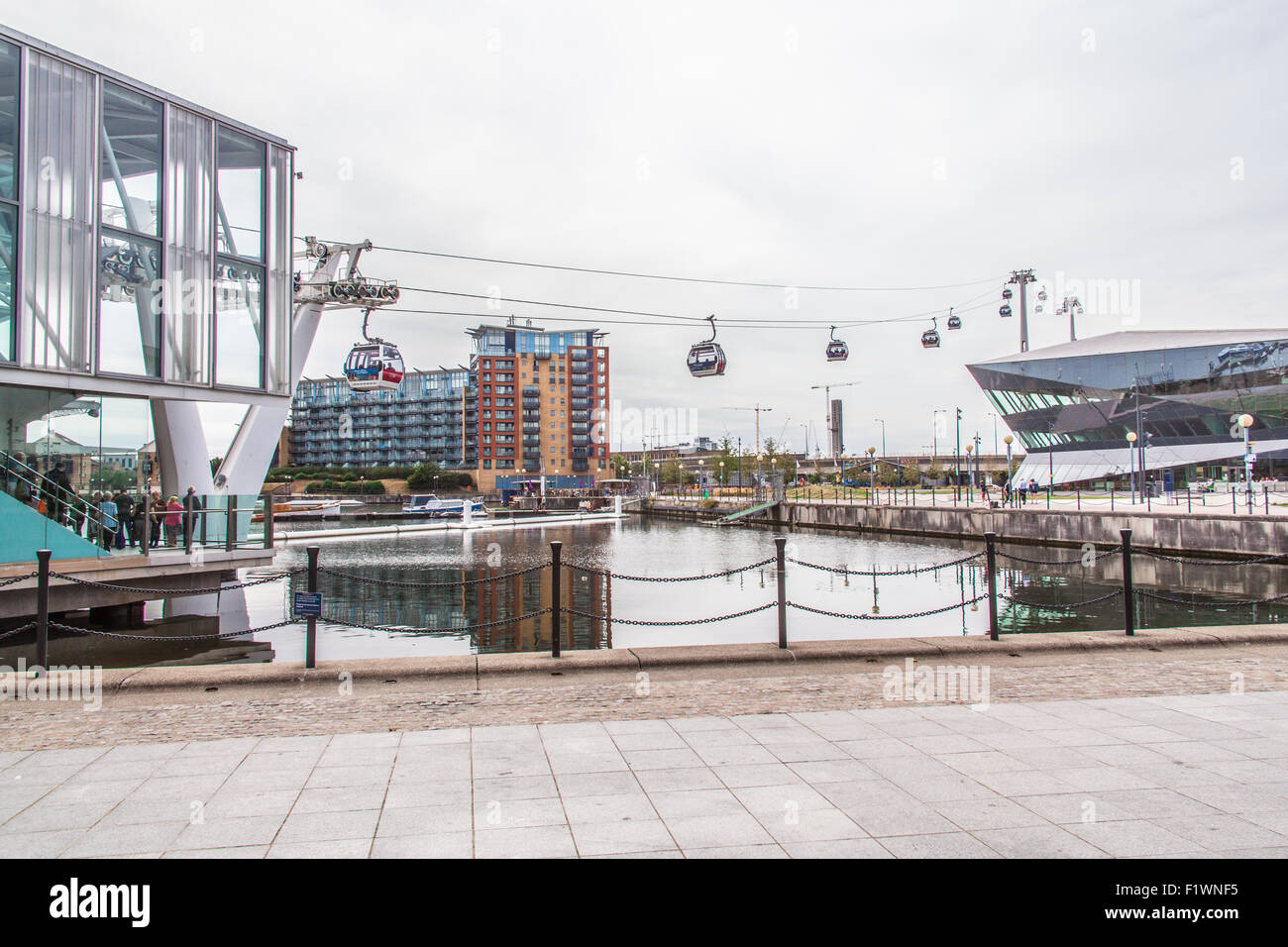 Emirates Air Line cable cars ride across the River Thames from North ...