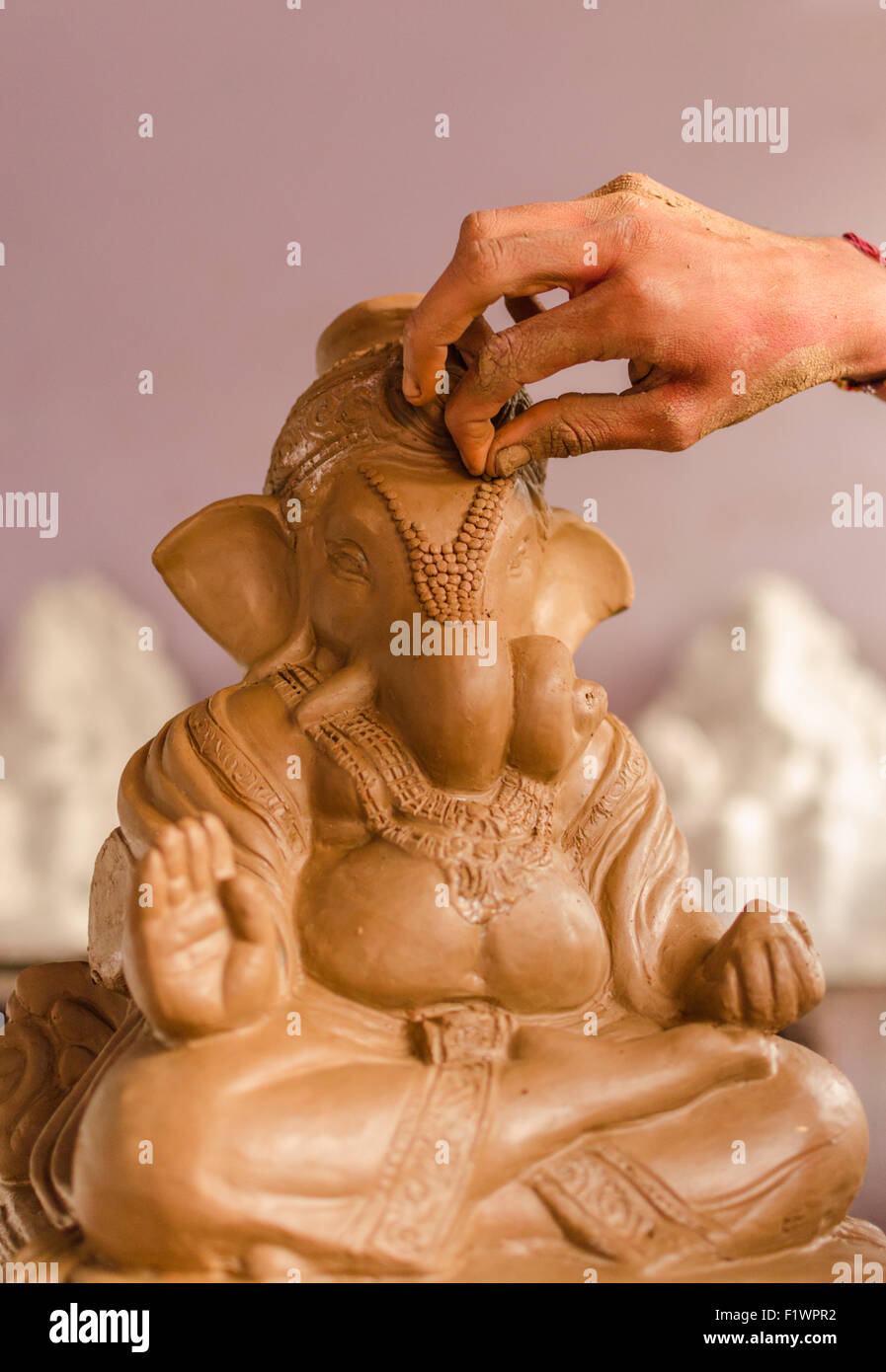 Ganesh idol making hi-res stock photography and images - Alamy