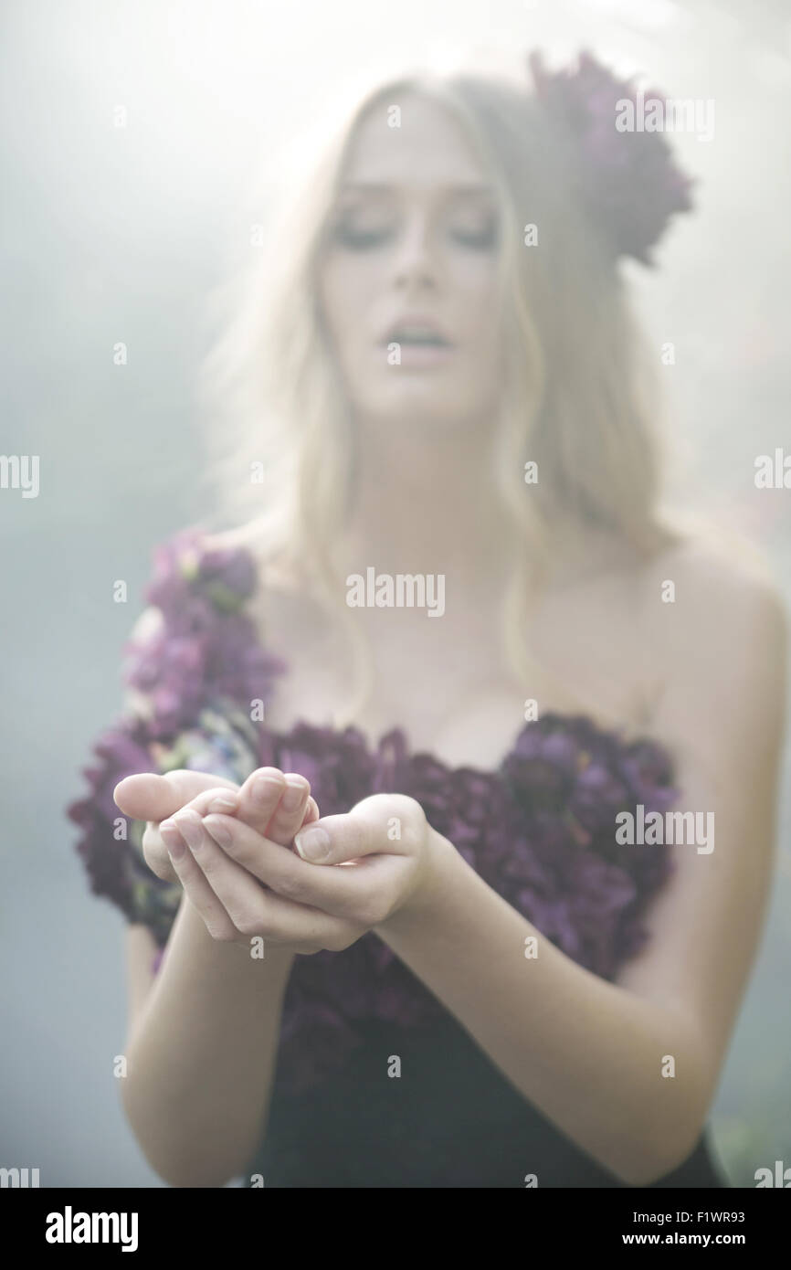 Marvelous blond lady dressed in flowery clothes Stock Photo - Alamy