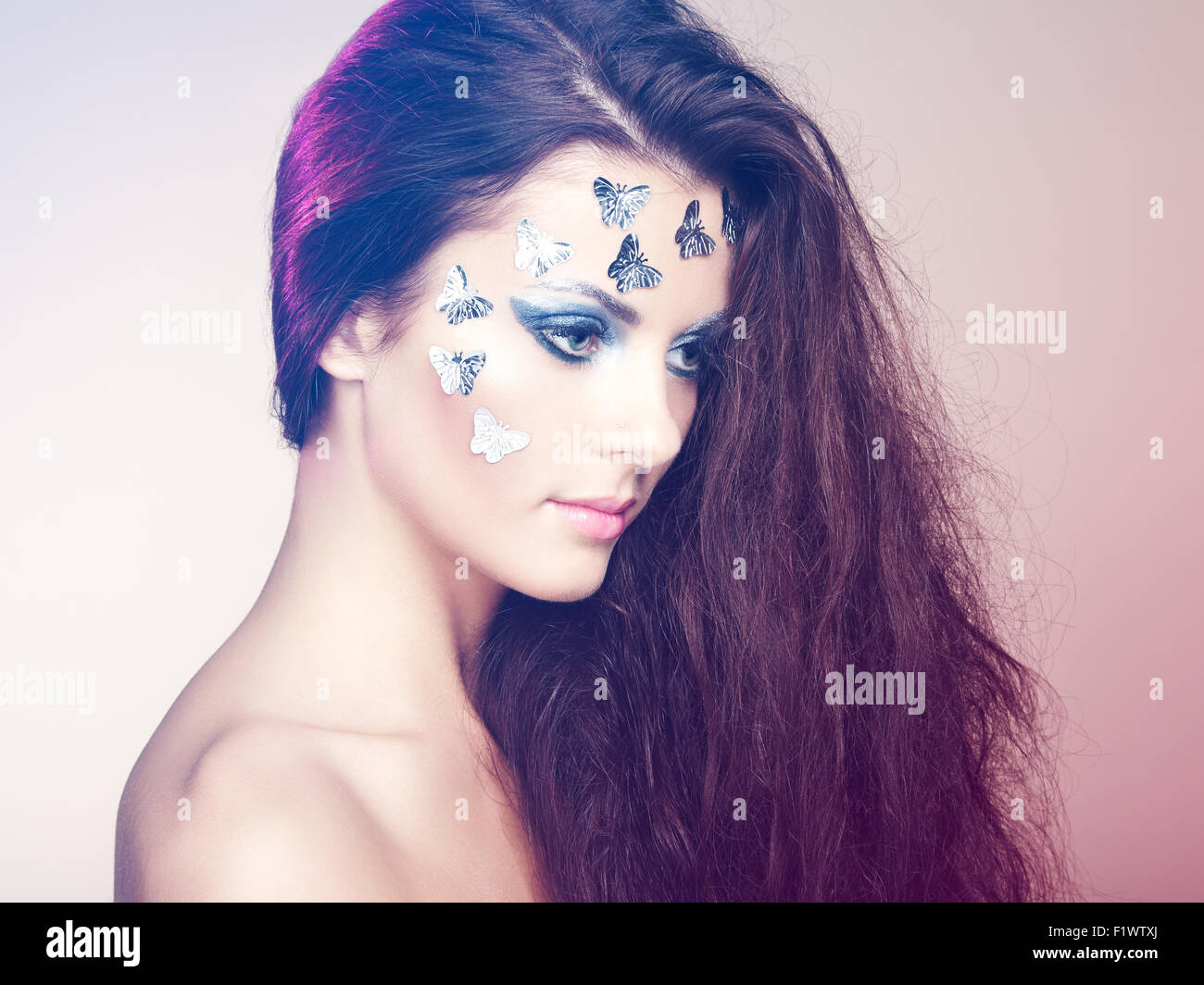 Portrait beautiful young woman with flying hair. Makeup with ...