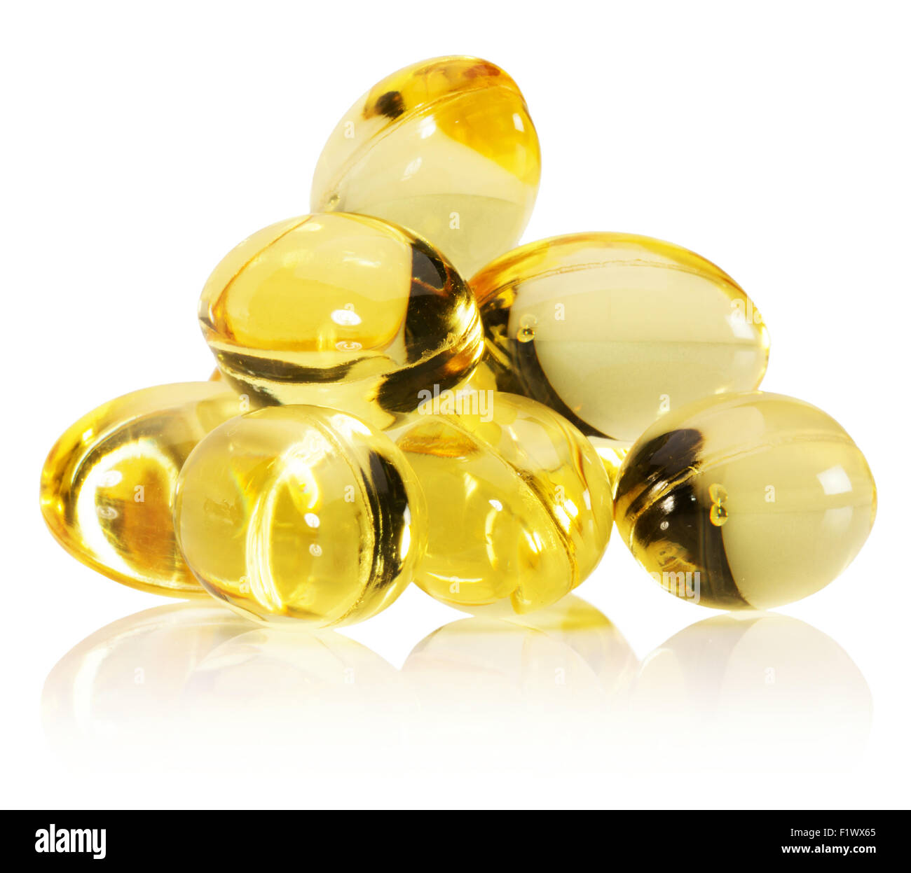 fish oil capsules isolated on white background Stock Photo - Alamy