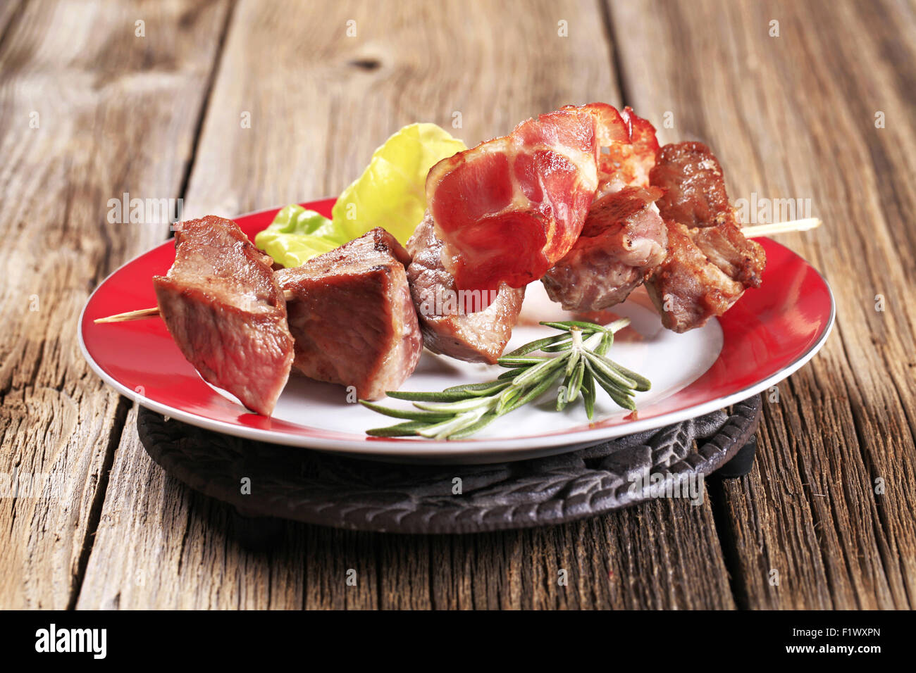 Grilled pieces of meat on stick Stock Photo - Alamy
