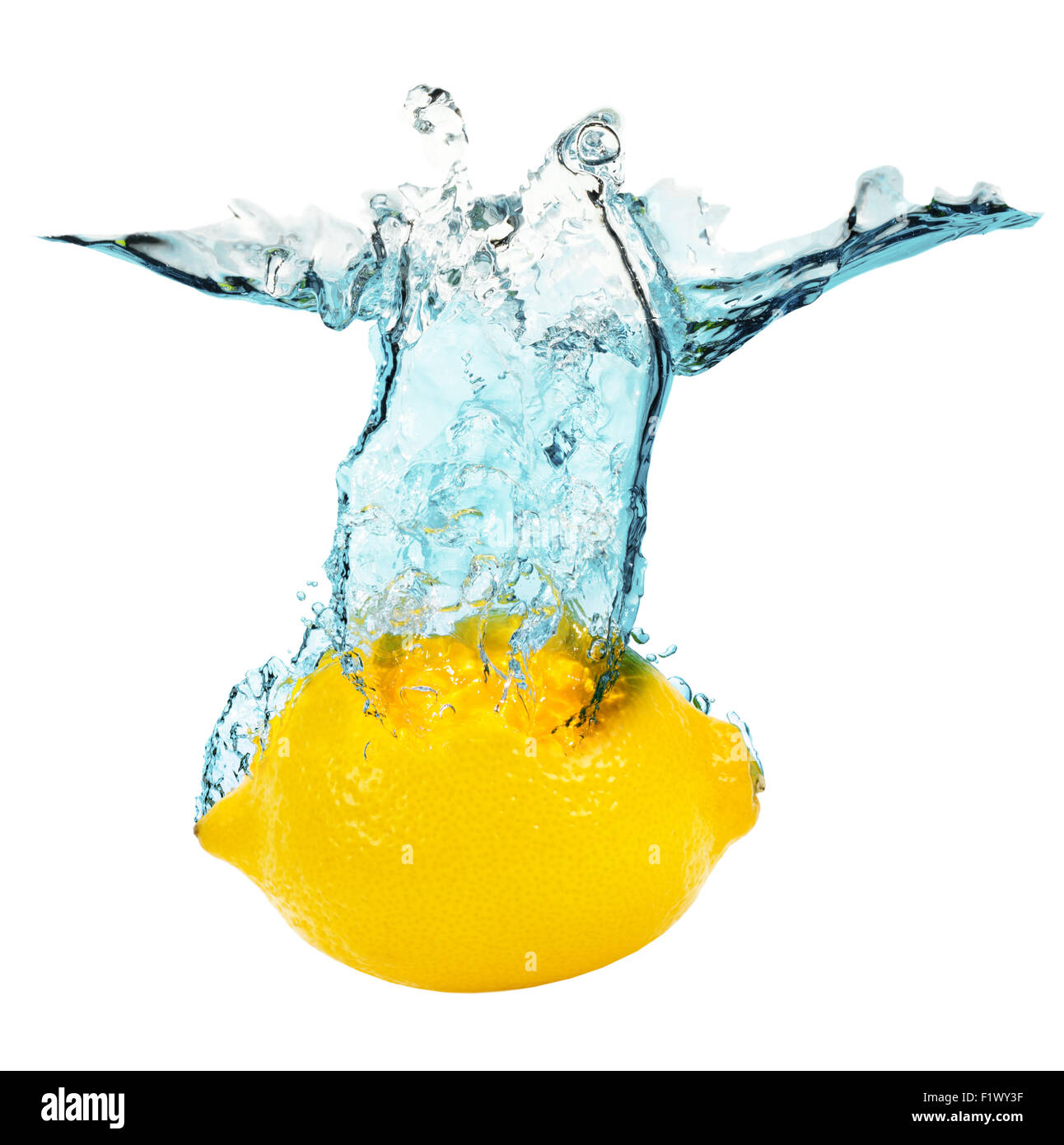 lemon falling in water on the white background Stock Photo - Alamy