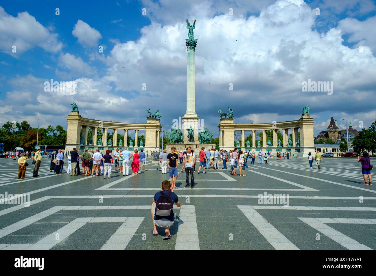 MILLENNIUM MONUMENT IN HEROES SQUARE BUDAPEST, WITH TOURISTS. HUNGARY ...