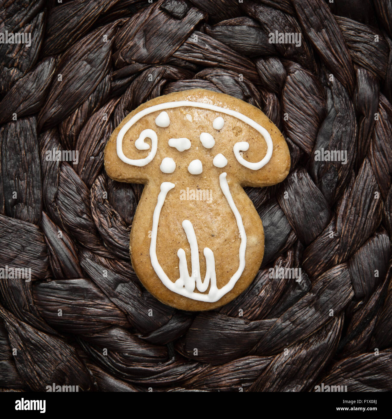 Tasty gingerbread mushroom on the dark background. Christmas theme ...