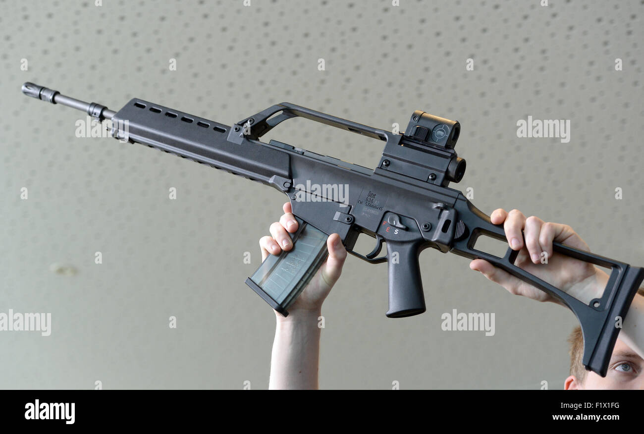 Oberndorf, Germany. 07th May, 2015. FILE - A man holds up a Heckler ...