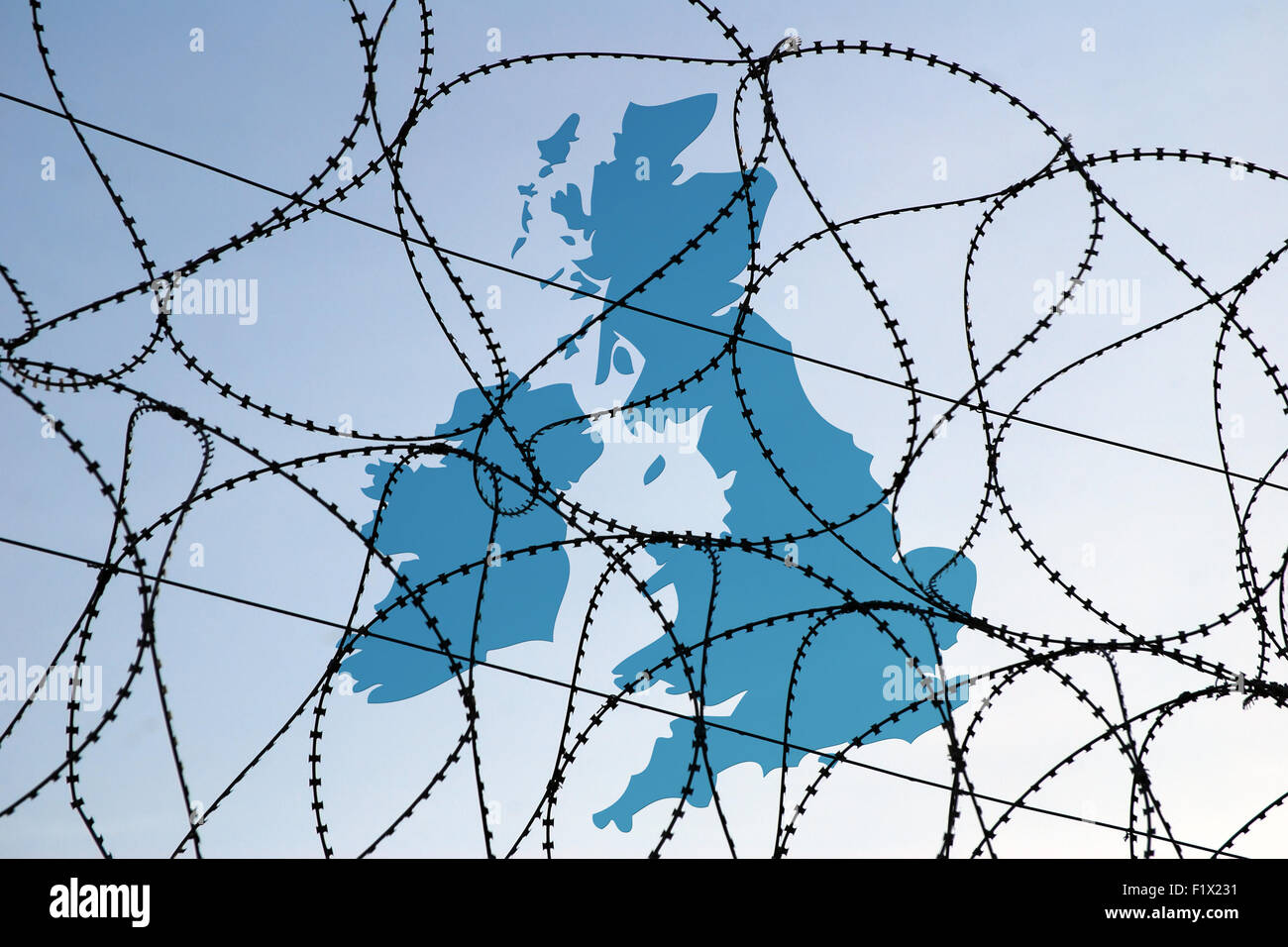 Conceptual image showing map of UK behind barbed wire barrier Stock ...