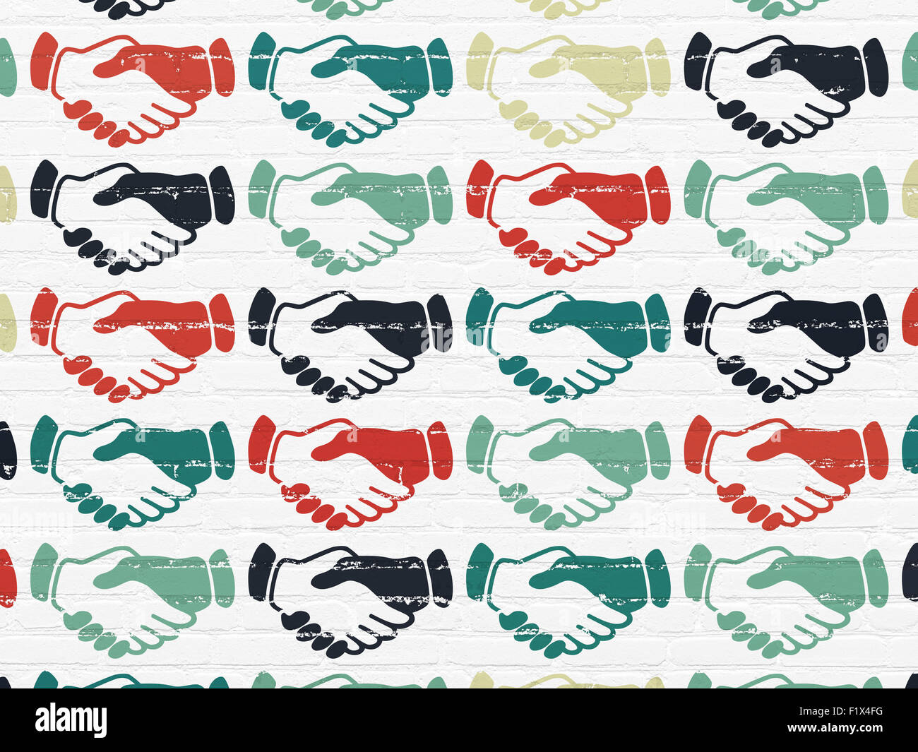 Political concept: Handshake icons on wall background Stock Photo - Alamy