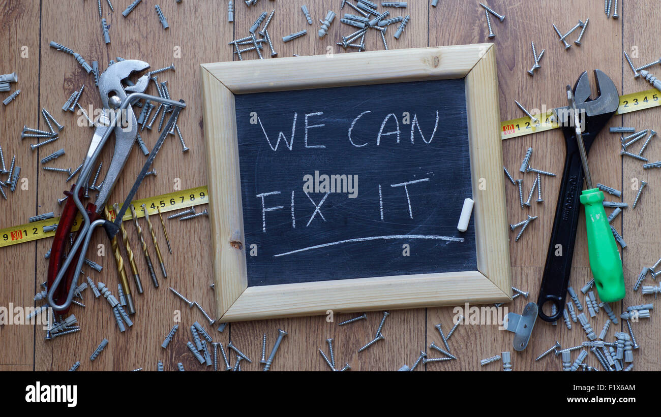 We can fix it written on a chalkboard next to tools, screws and dowels ...