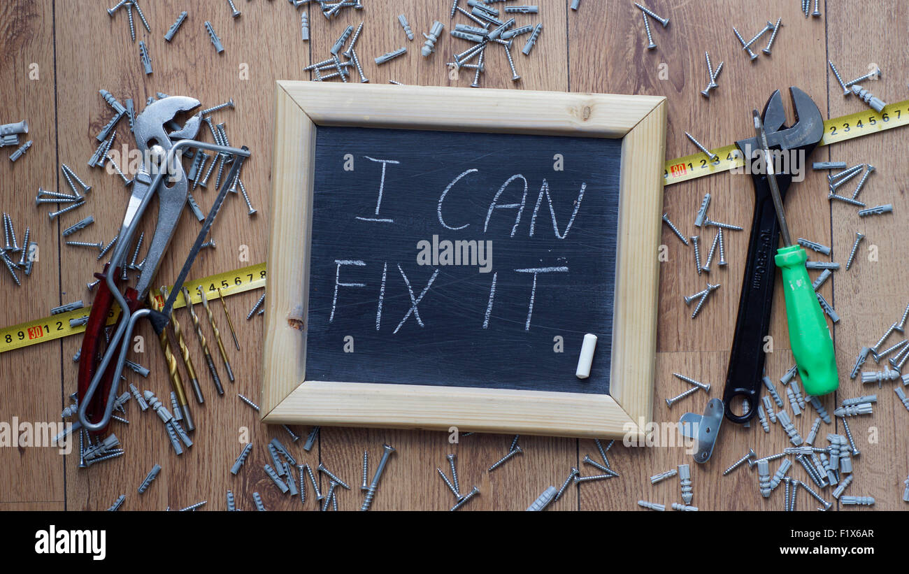 I can fix it written on a chalkboard next to tools, screws and dowels ...